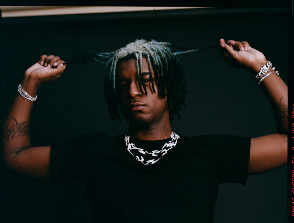 10 Rising Hip-Hop Artists To Watch In 2024